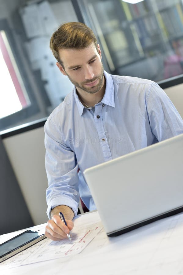 Man Designer in Office Working on a Project Stock Photo - Image of ...