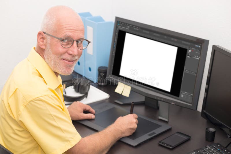Man Designer Using Graphics Tablet for Editing Stock Photo - Image of ...
