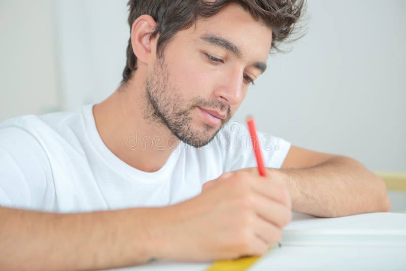 Man at Desk with Ruler and Pencil Stock Image - Image of person ...