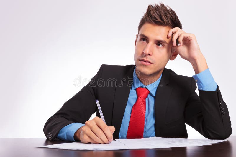 Man Thinking at Office Desk Stock Photo - Image of papers, prestige ...