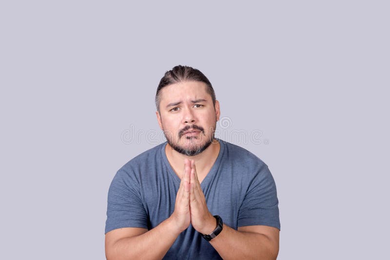 A Man Desperately Asks for Forgiveness or Pleading for Help. Clasping ...