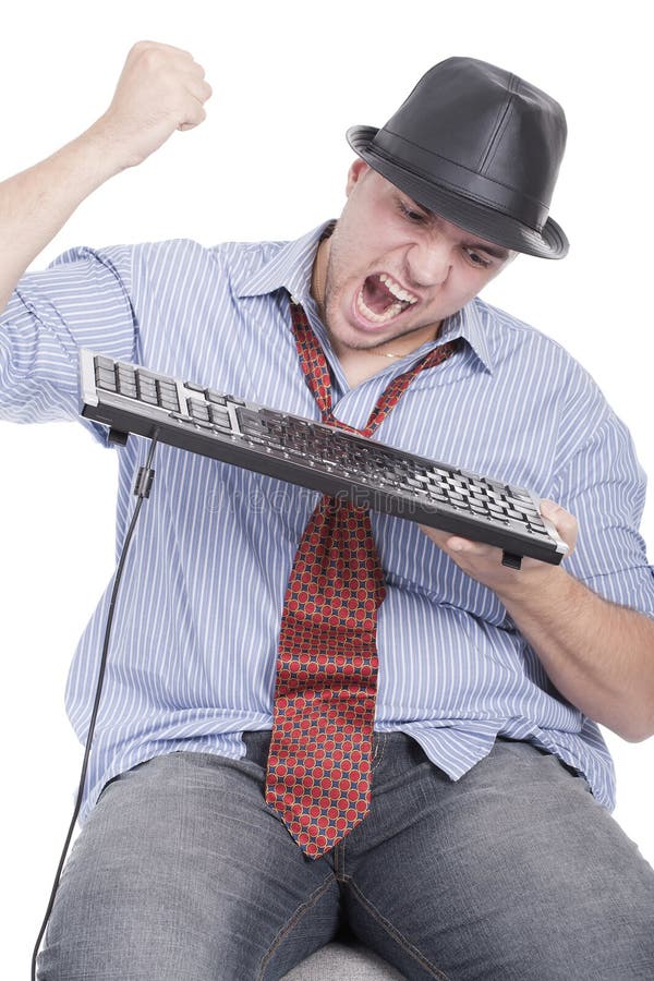 Man destroying keyboard stock image. Image of male, person - 16659661