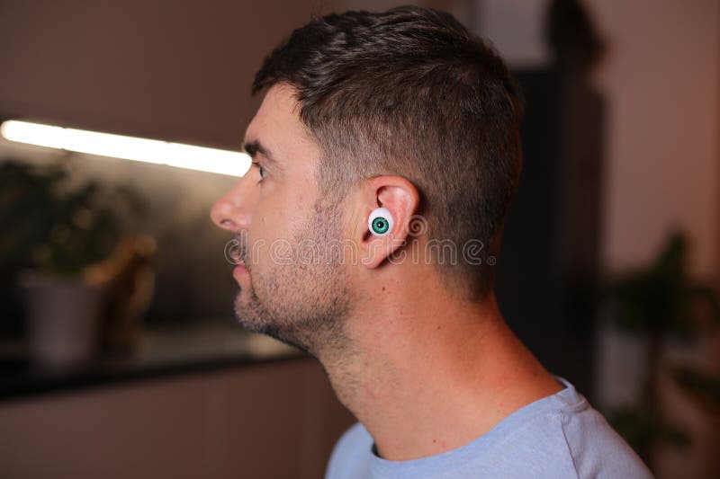 Man Developing a Weird Eye on His Ear To Gossip Stock Image - Image of ...