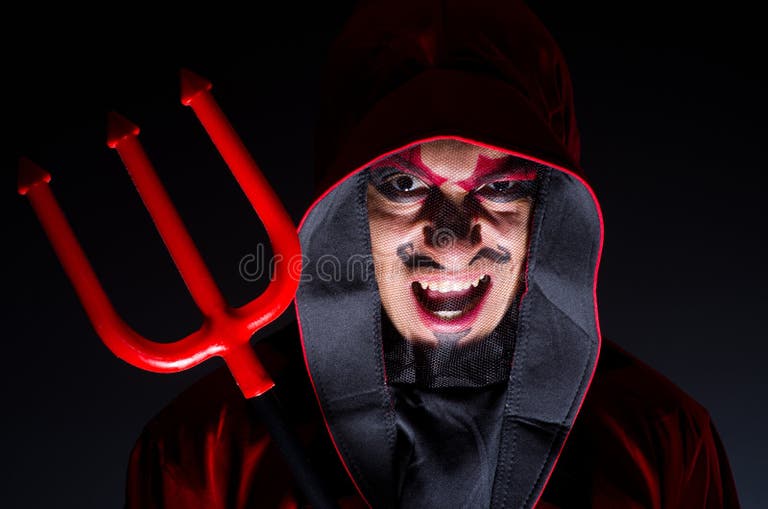 Man in devil costume stock photo. Image of character - 33680506