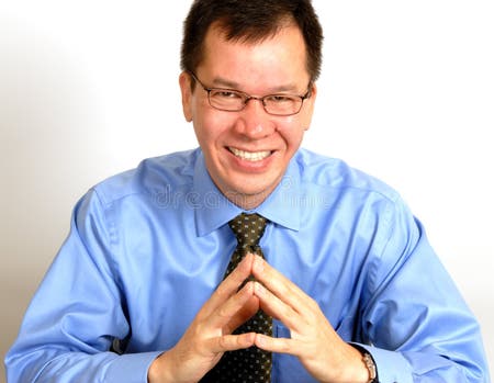 Man with a Devious Smile stock photo. Image of office - 2835102