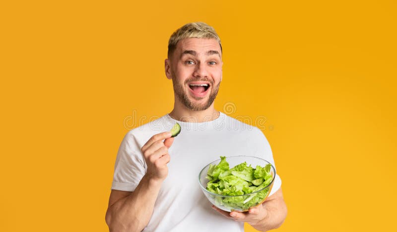 Man Diet Fun at Studio. Happy Guy Eat Vegetables Stock Photo - Image of ...