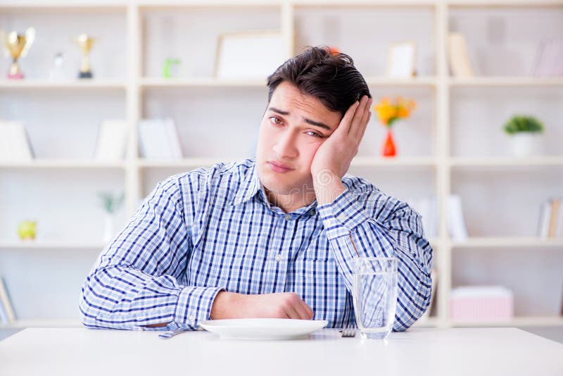 The Man on Diet Waiting for Food in Restaurant Stock Photo - Image of ...