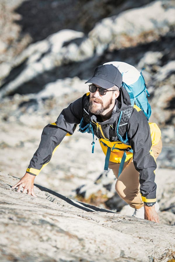 Man during a Difficult Mountain Hike Stock Photo - Image of success ...