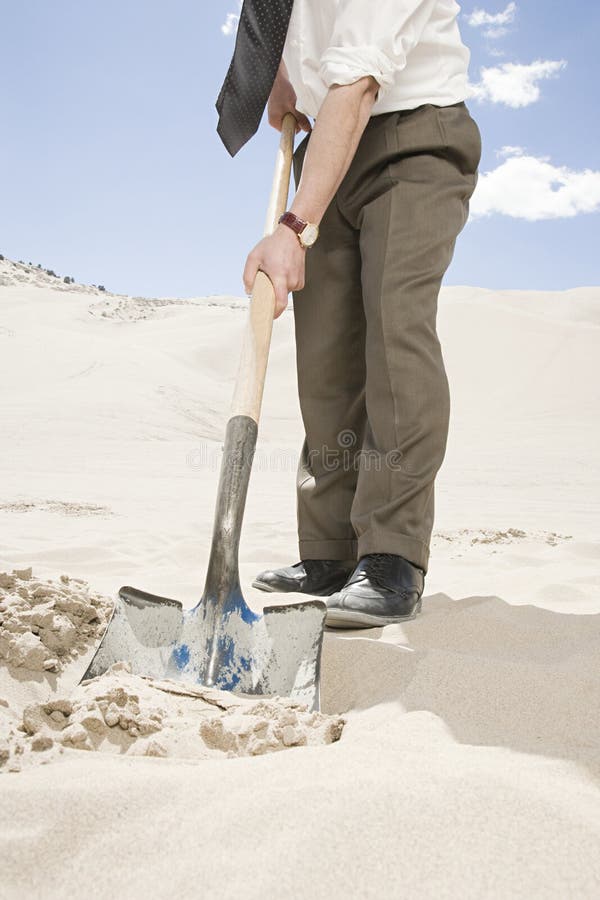 Man digging in desert stock photo. Image of nature, formal - 62807714