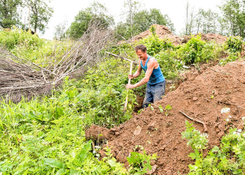 Man digging the ground. stock image. Image of preparation - 69481019