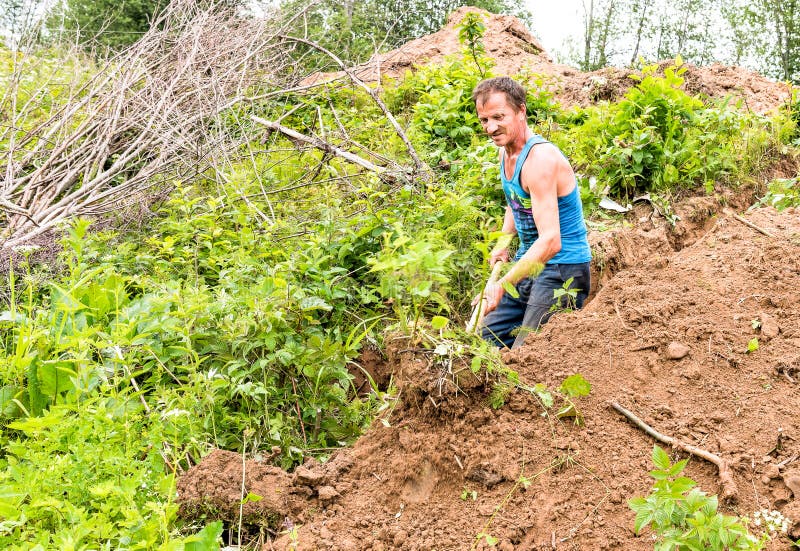 Man digging the ground. stock image. Image of gardener - 69481519