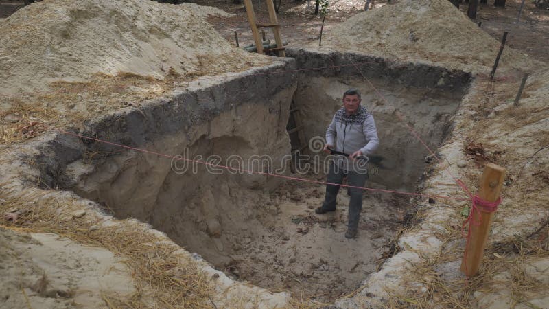 Man digging a hole stock footage. Video of brick, throw - 302308624