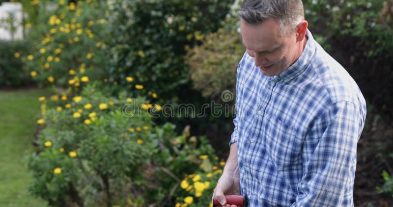 Man Digging with Shovel in the Garden 4k Stock Footage - Video of ...