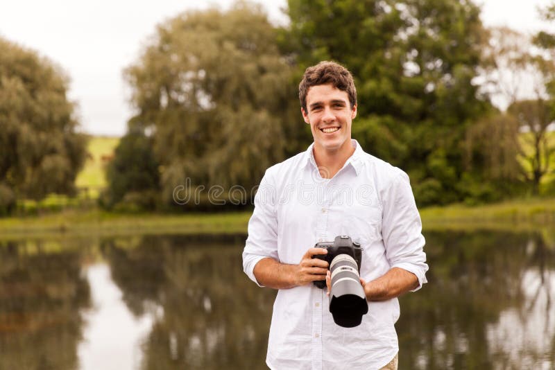 Man digital camera stock image. Image of lake, handsome - 50967343