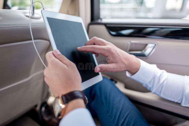 Man with Digital Tablet in Car Stock Photo - Image of communication ...