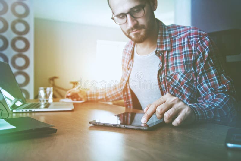 Man with Digital Tablet, Laptop and Pen at Table Stock Image - Image of ...