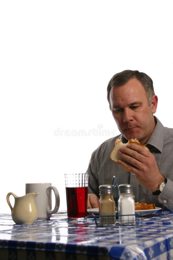 Man in Diner Eating Sandwich Stock Image - Image of diner, salt: 1686887