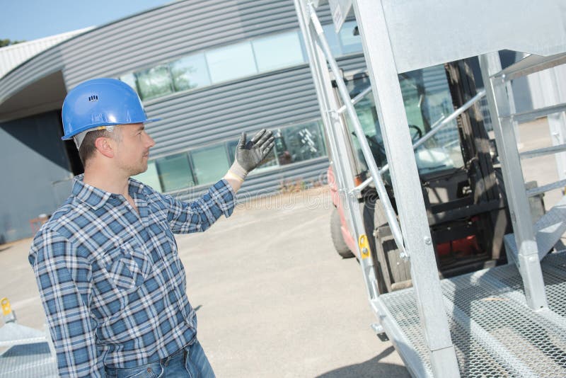 Man directing forklift stock photo. Image of foreman - 271543062