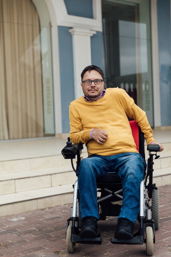 Man with Disabilities in Wheelchair Walking Stock Image - Image of ...