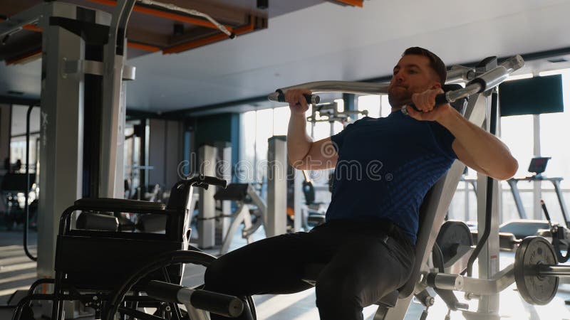Man with Disability Doing Upper Body Workout in Modern Gym Stock ...