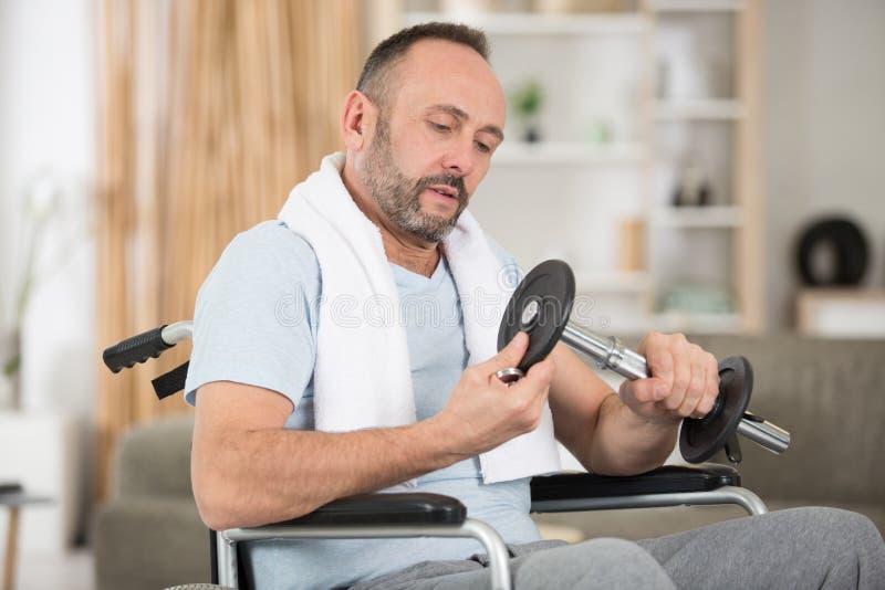 Man Disabled in Wheelchair with Dumbbells in Hands Stock Image - Image ...