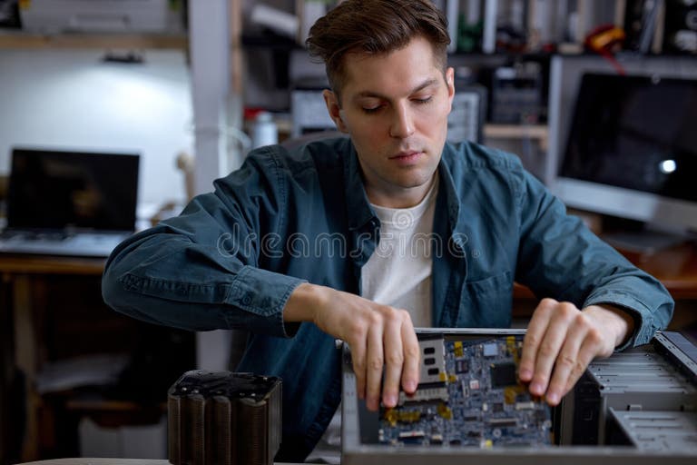 Man Disassembles Broken Computer. Computer Service and Repair Concept ...