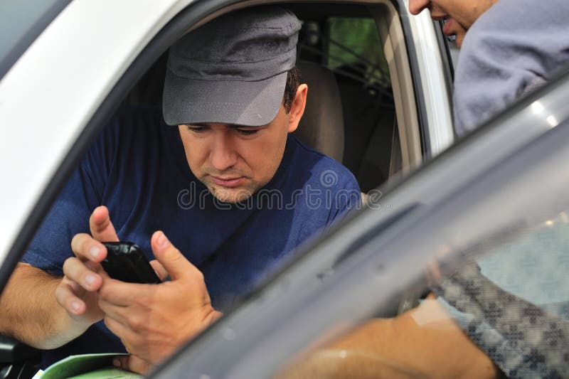Men Watching Navigator and Discuss about Destination Stock Photo ...