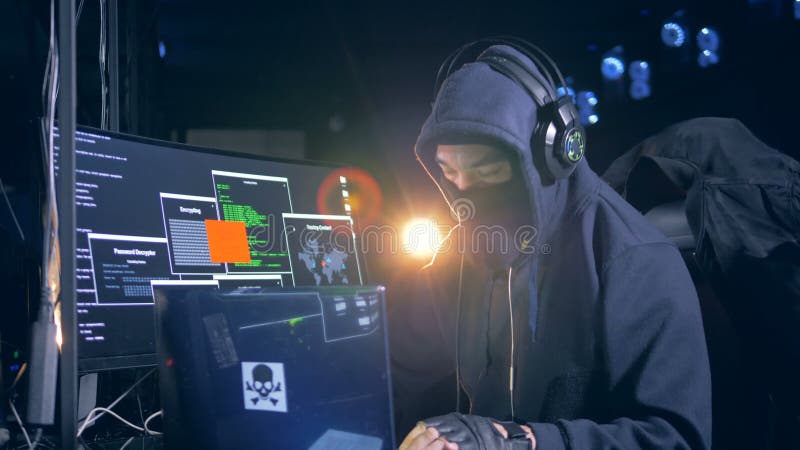 Man in Disguise is Hacking into Computer`s Network Stock Footage ...