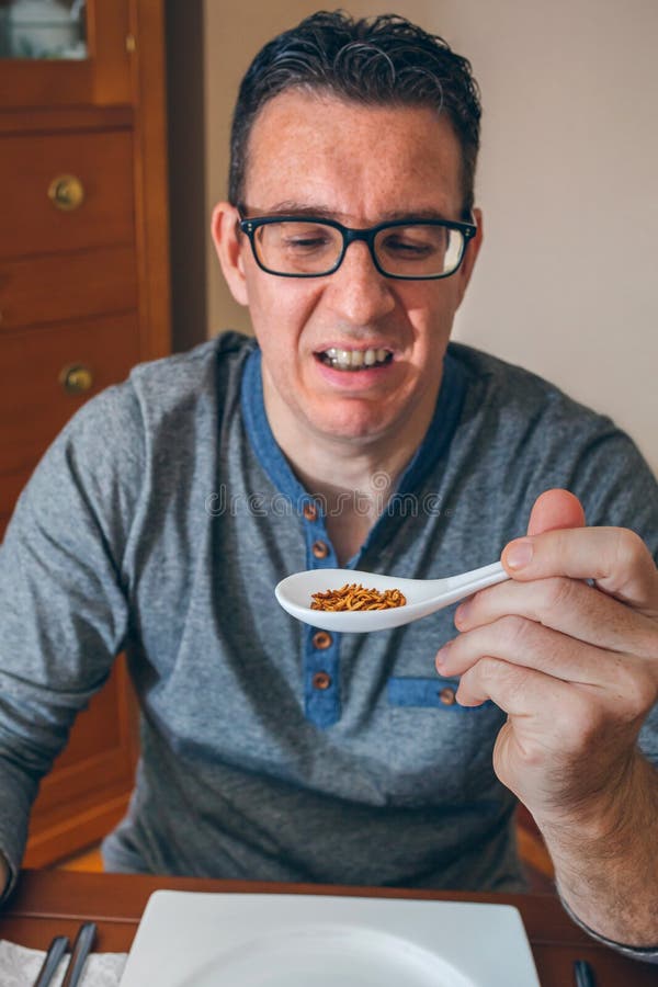 Man with Disgusted Face Looking Worms Stock Photo - Image of ...