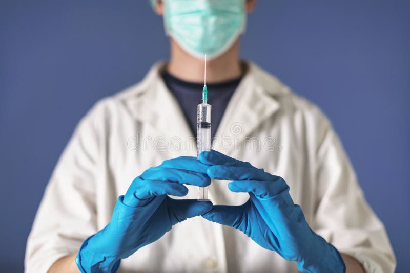 Injection, syringe in hand stock image. Image of young - 157237559