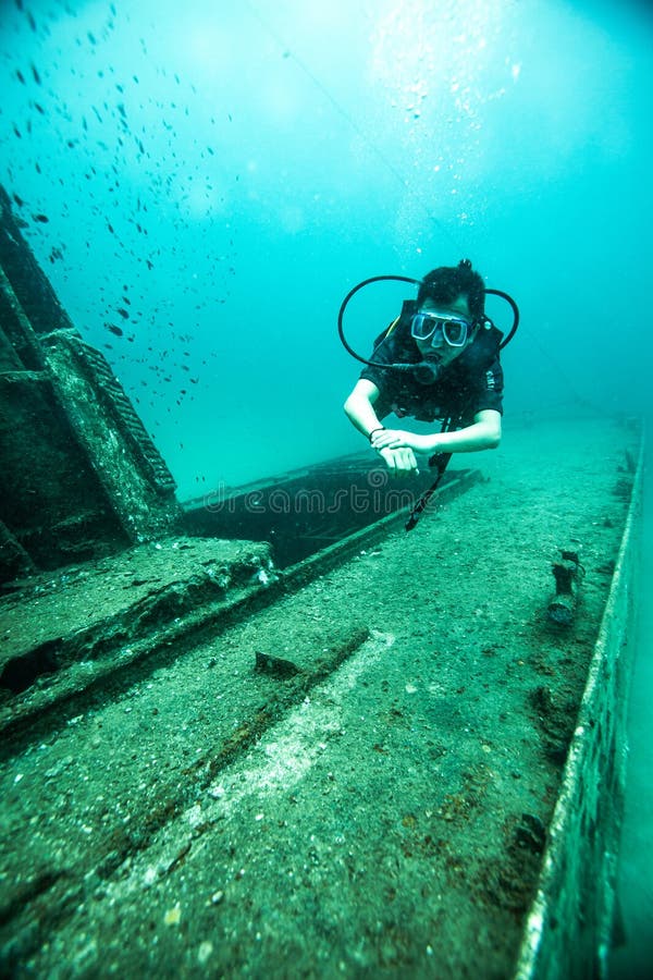 Man Diving in Deep Blue Indian Ocean Stock Photo - Image of sunken ...
