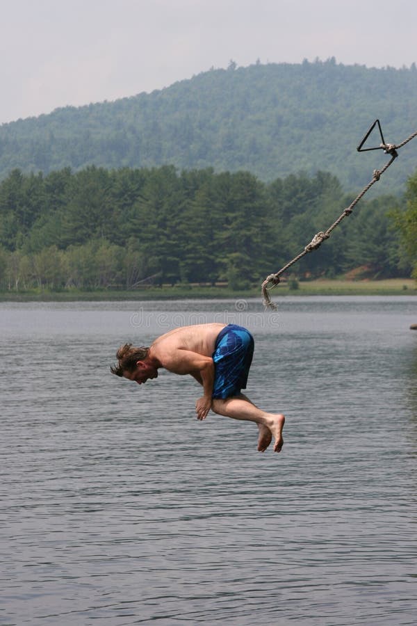 Man diving in lake stock photo. Image of fall, water, flop - 8655594