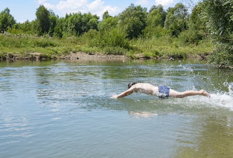 Man diving stock image. Image of river, sport, activity - 123188749