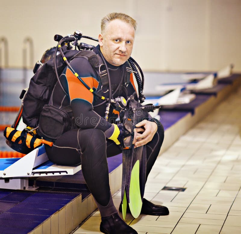 Man in a diving suit stock image. Image of equipment - 63963687