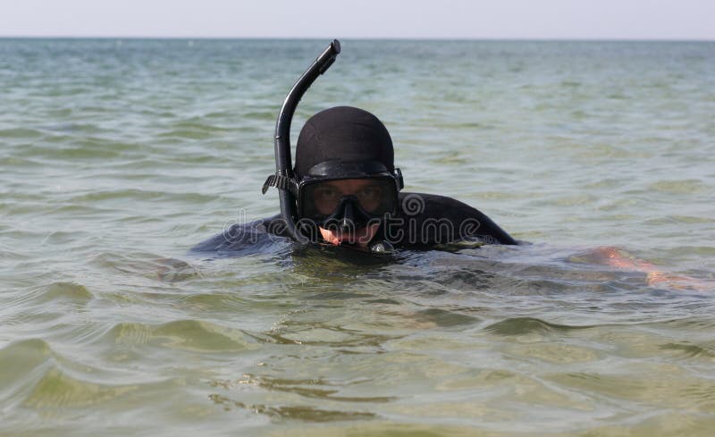 A Man in a Diving Suit and Mask Underwater Stock Image - Image of ...