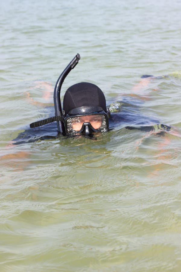 A Man in a Diving Suit and Mask Underwater Stock Photo - Image of tube ...
