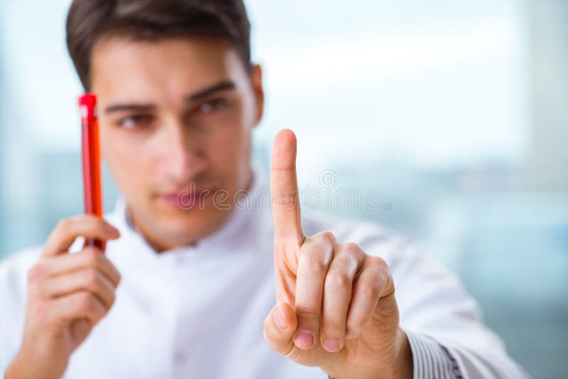 The Man Doctor Checking Blood Samples in Lab Stock Photo - Image of ...