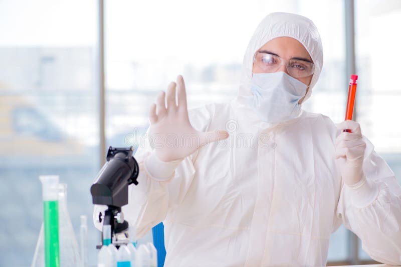 The Man Doctor Checking Blood Samples in Lab Stock Image - Image of ...