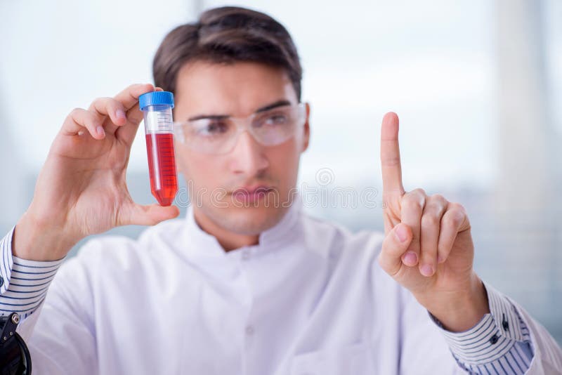 The Man Doctor Checking Blood Samples in Lab Stock Photo - Image of ...