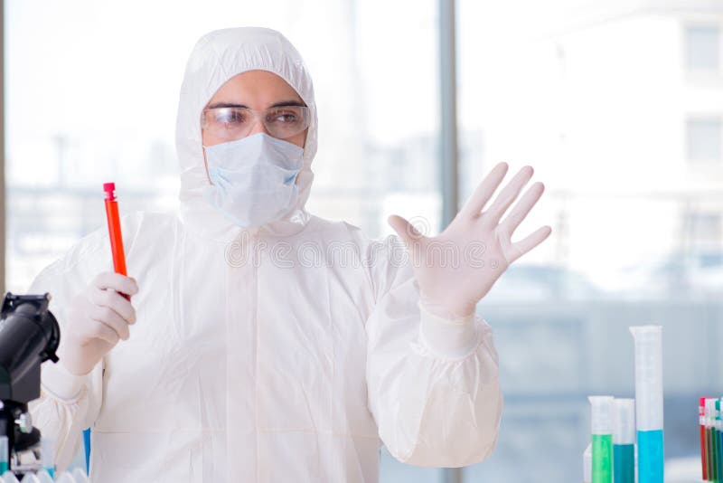 The Man Doctor Checking Blood Samples in Lab Stock Image - Image of ...