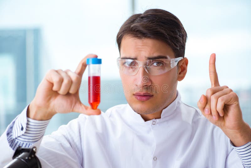 The Man Doctor Checking Blood Samples in Lab Stock Photo - Image of ...