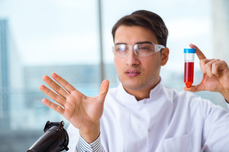 The Man Doctor Checking Blood Samples in Lab Stock Photo - Image of ...