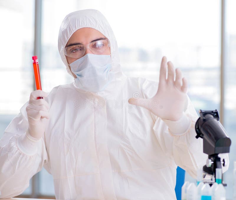 Man Doctor Checking Blood Samples in Lab Stock Photo - Image of ...