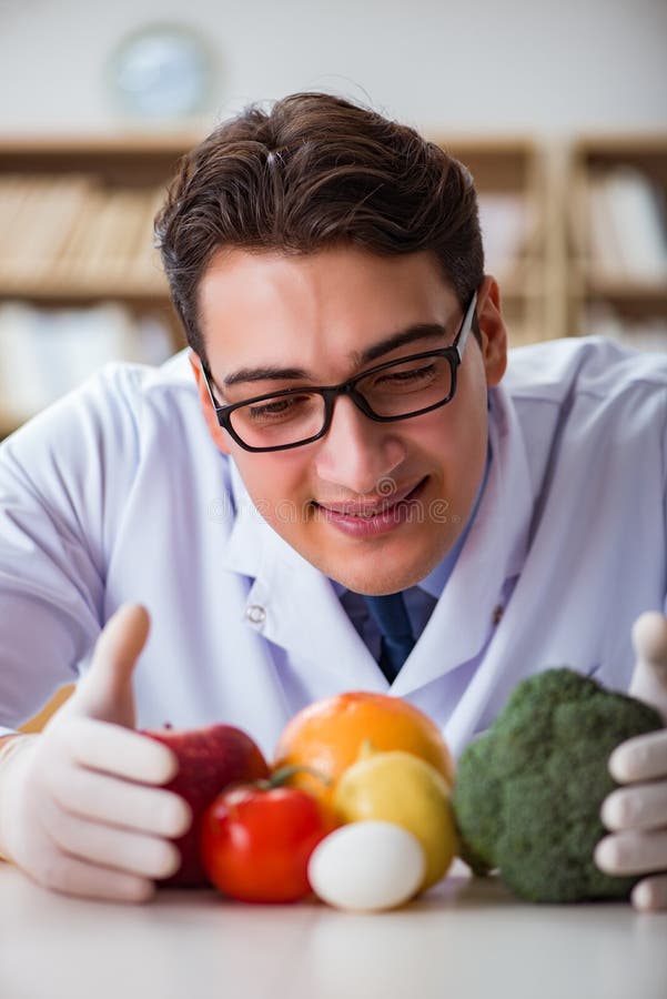 The Man Doctor Checking the Fruits and Vegetables Stock Photo - Image ...