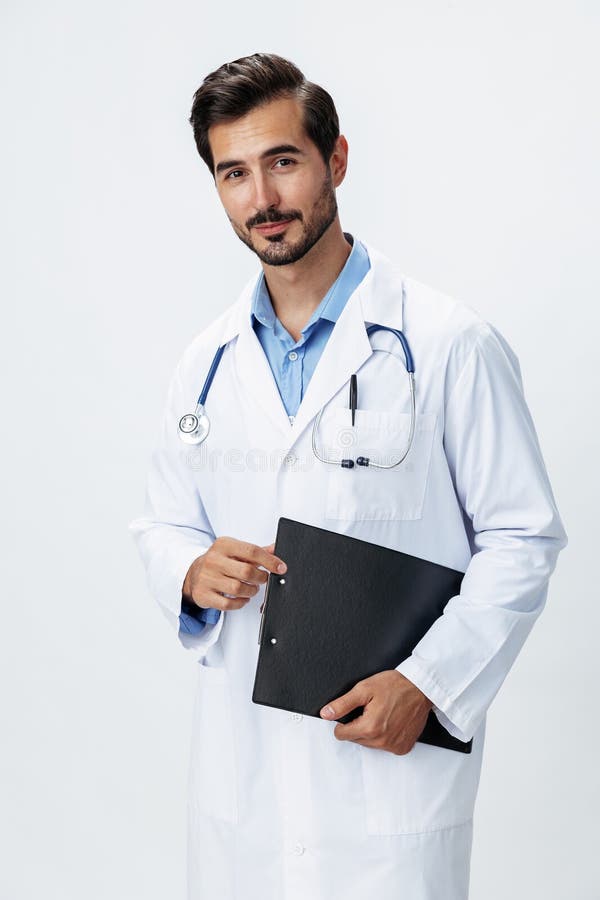 Man Doctor In White Coat With Stethoscope And Folder For Notes And