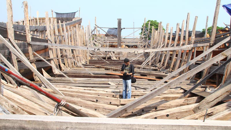 A Man Documents the Process of Making Wooden Ships Editorial Stock ...