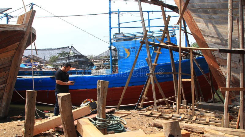 A Man Documents the Process of Making Wooden Ships Editorial Stock ...