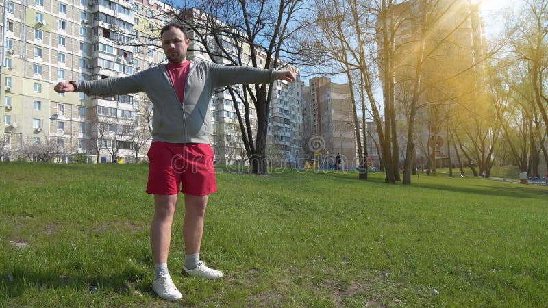 Man Does Physical Exercise on Grass in Park Stock Video - Video of ...