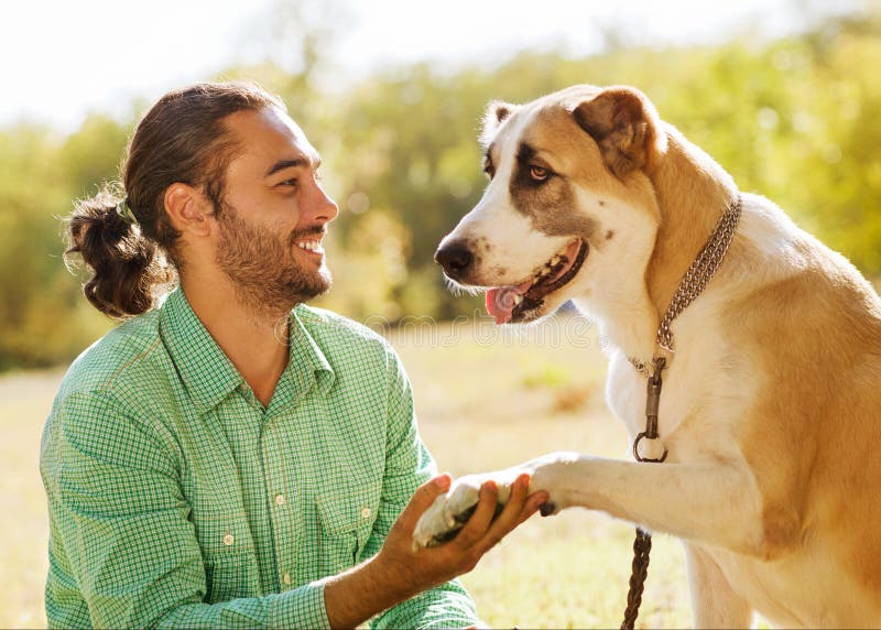 Man and dog stock image. Image of adult, animal, life - 34518685