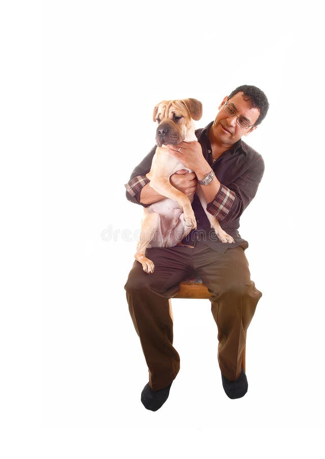 Man with dog on lap. stock image. Image of love, handsome - 24222671